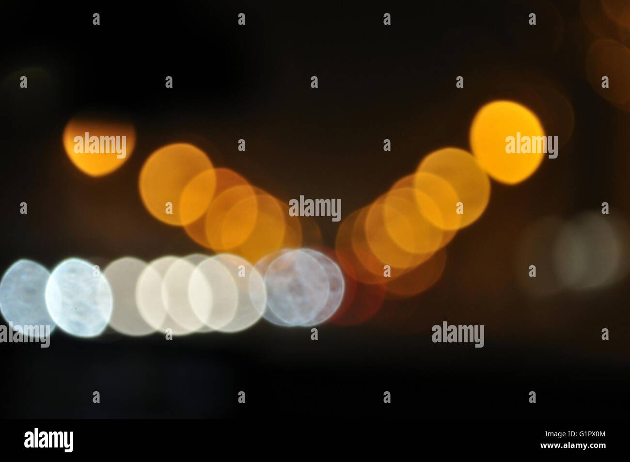 Decorative blurred neon lights on street Stock Photo - Alamy