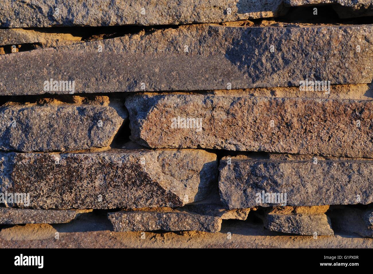 Detail view of a stone wall background Stock Photo - Alamy
