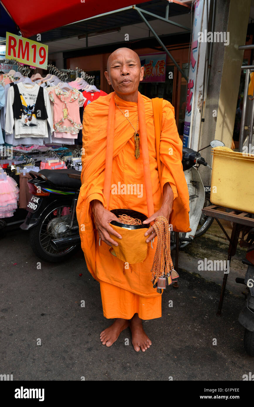 Begging monk, Chinatown, Georgetown, Penang, Malaysia Stock Photo - Alamy