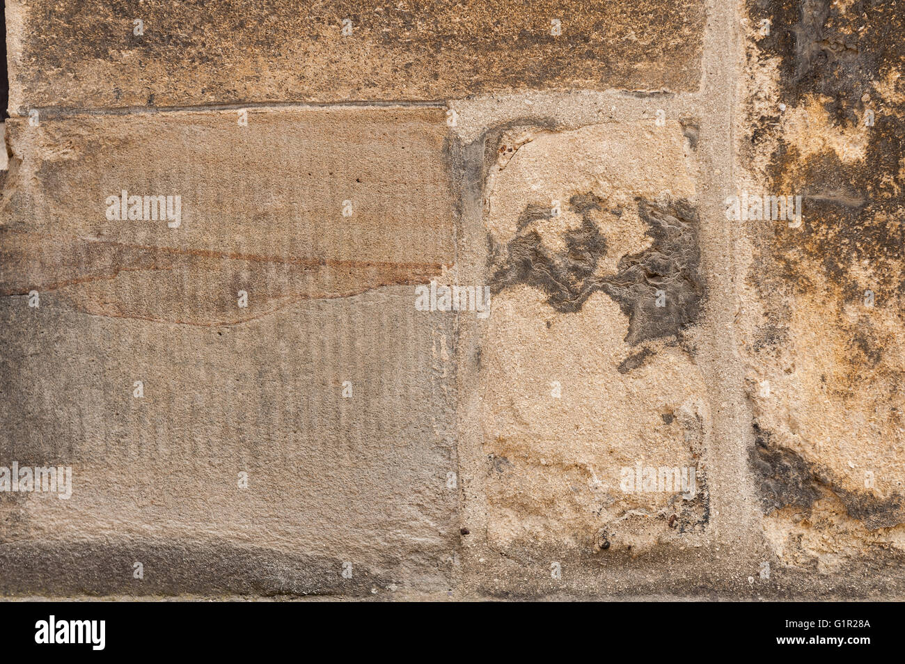 variation in surface of ragstone with stone mason marks groves stained ...