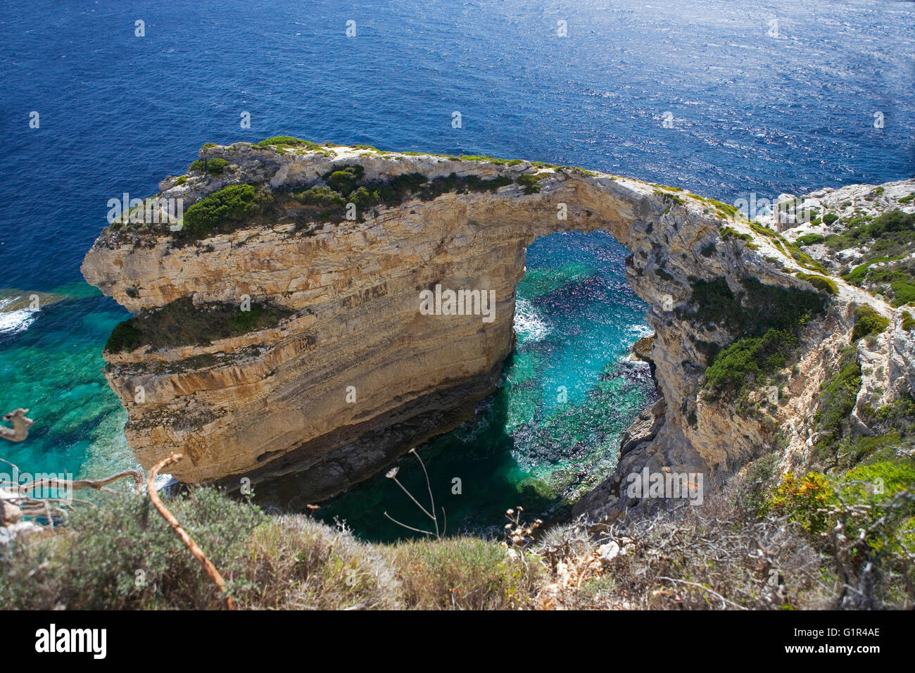 The spectacular Tripitos Arch on the rugged SW coast of Paxos, Greece ...