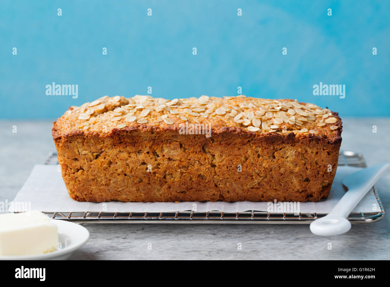 Healthy vegan oat, coconut loaf bread, cake on a cooling rack Copy ...