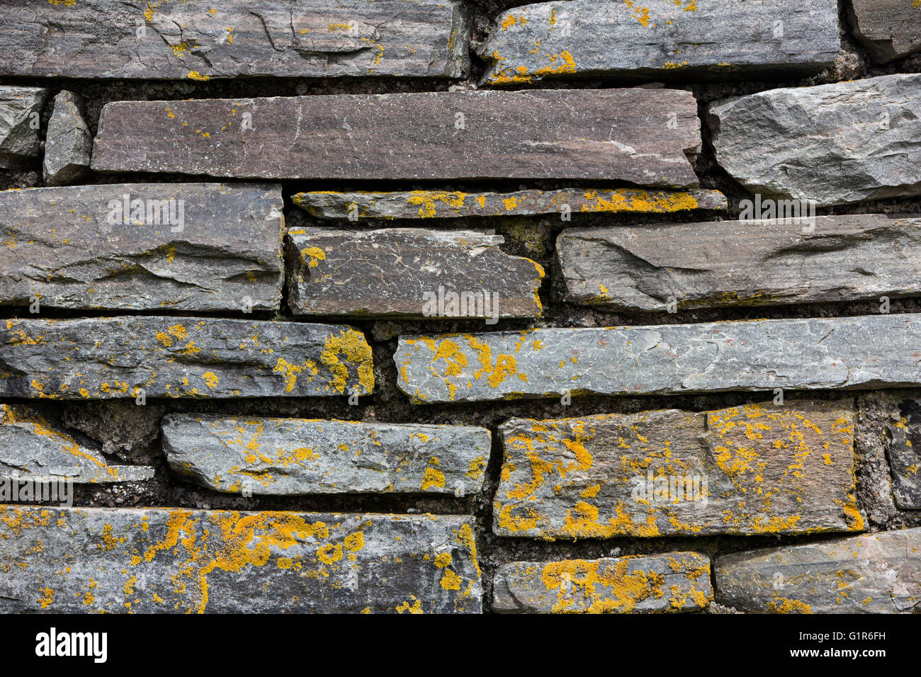Section of a stone wall Stock Photo - Alamy