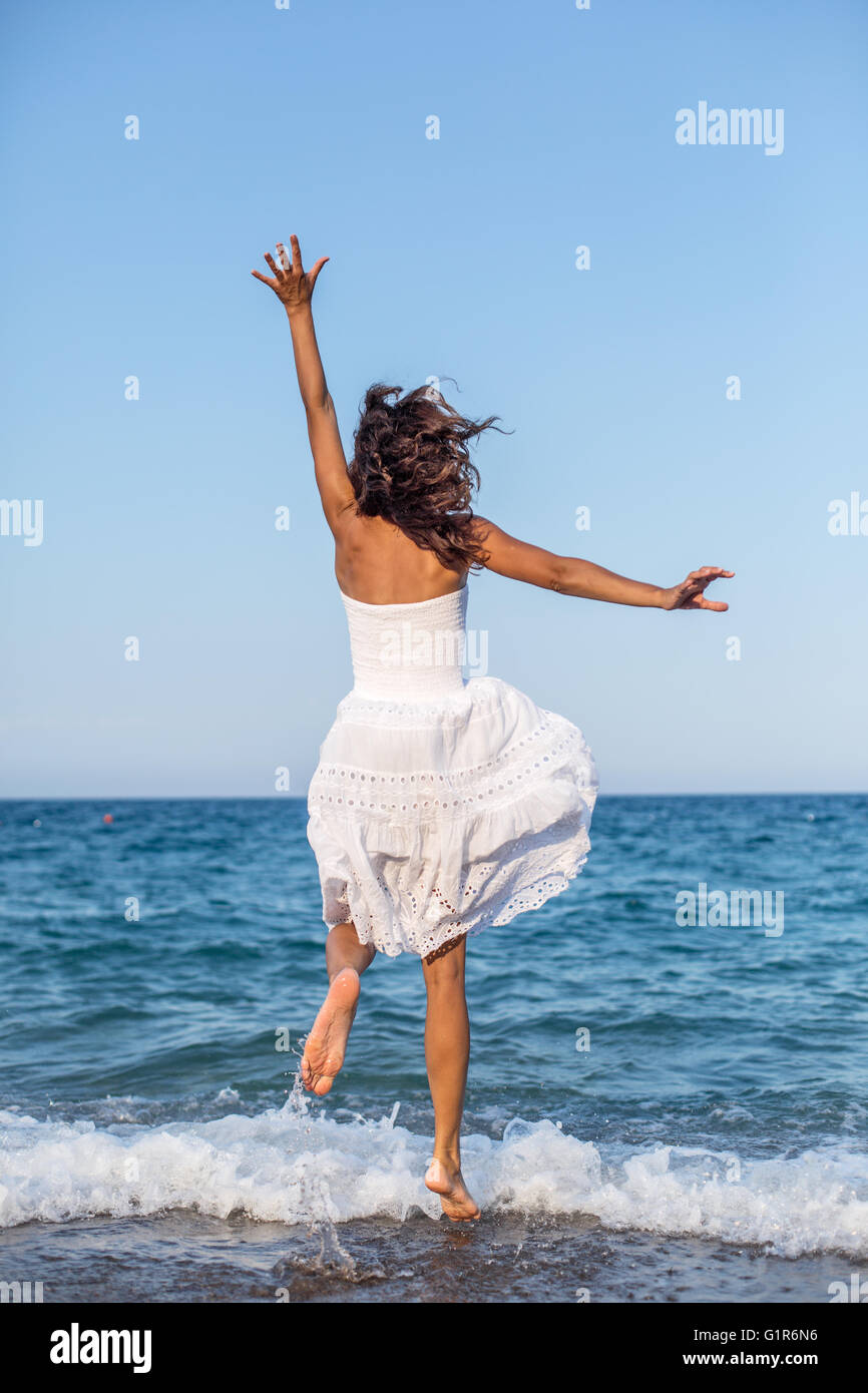 Sea woman jumping hi-res stock photography and images - Alamy