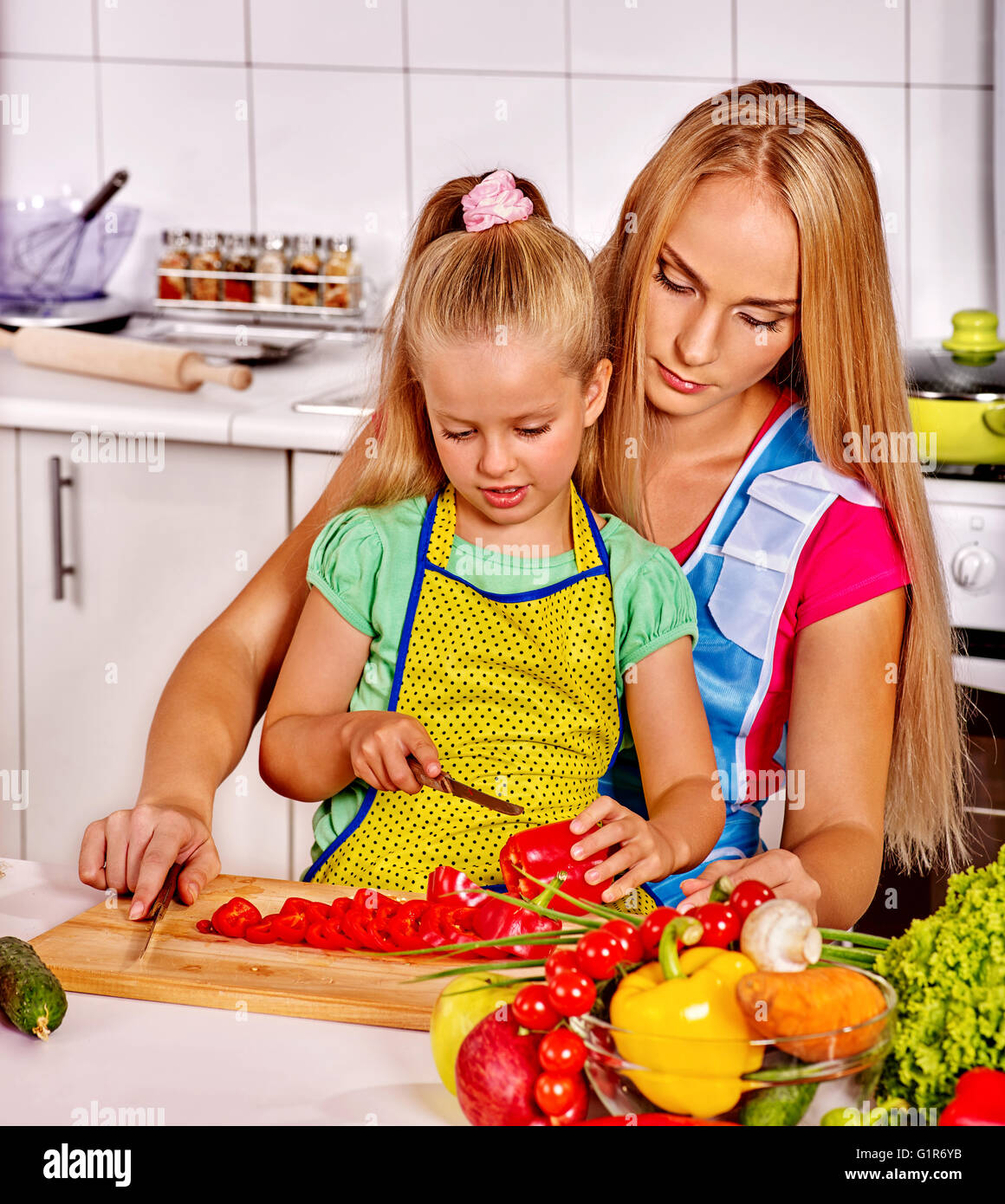 Mother and child cooking at kitchen Stock Photo - Alamy