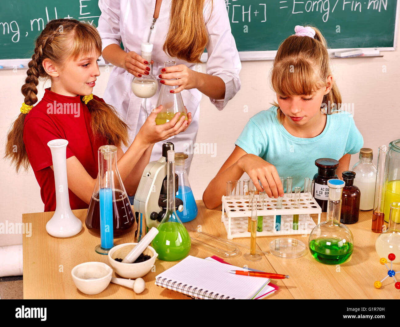 Child in chemistry class Stock Photo - Alamy