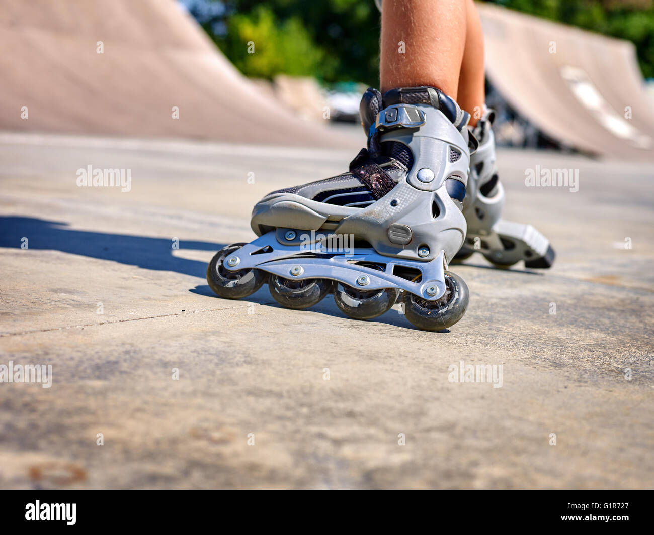 Girl riding on roller skates Stock Photo - Alamy