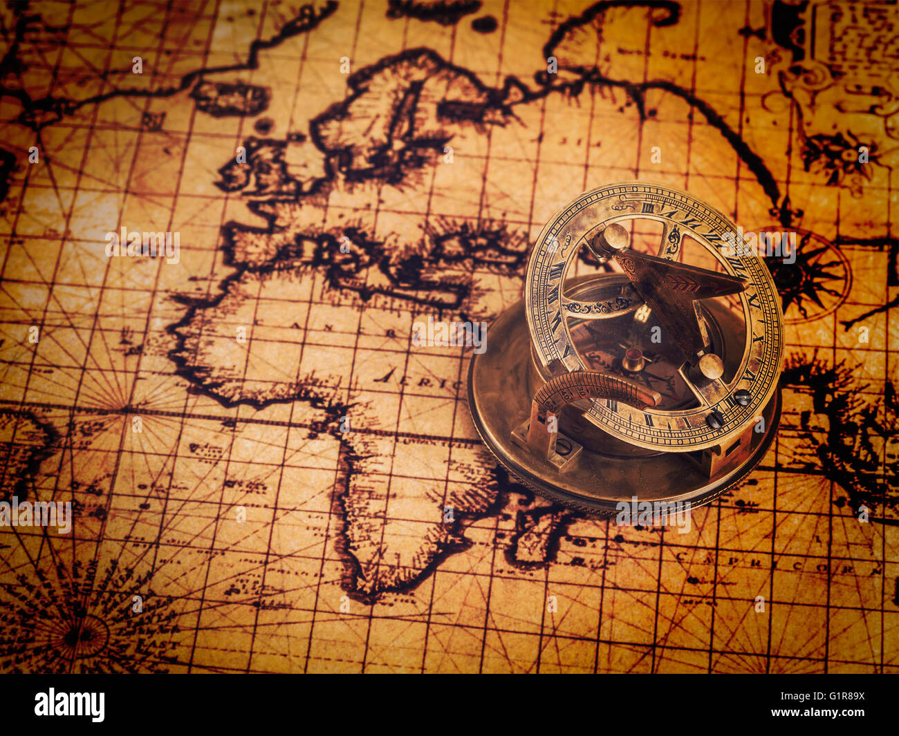 Old vintage compass on ancient map Stock Photo - Alamy