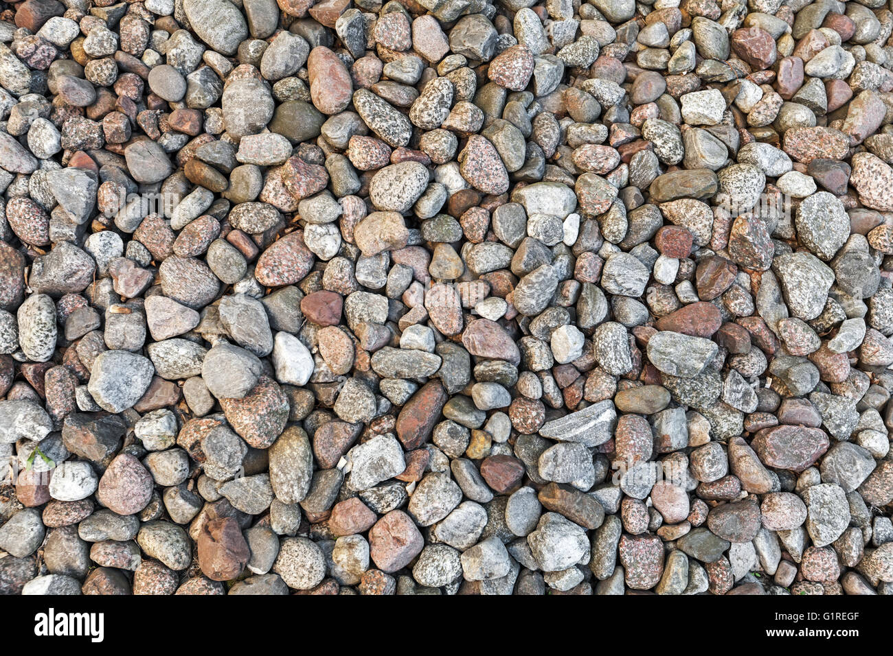Round stones, natural photo background texture Stock Photo - Alamy