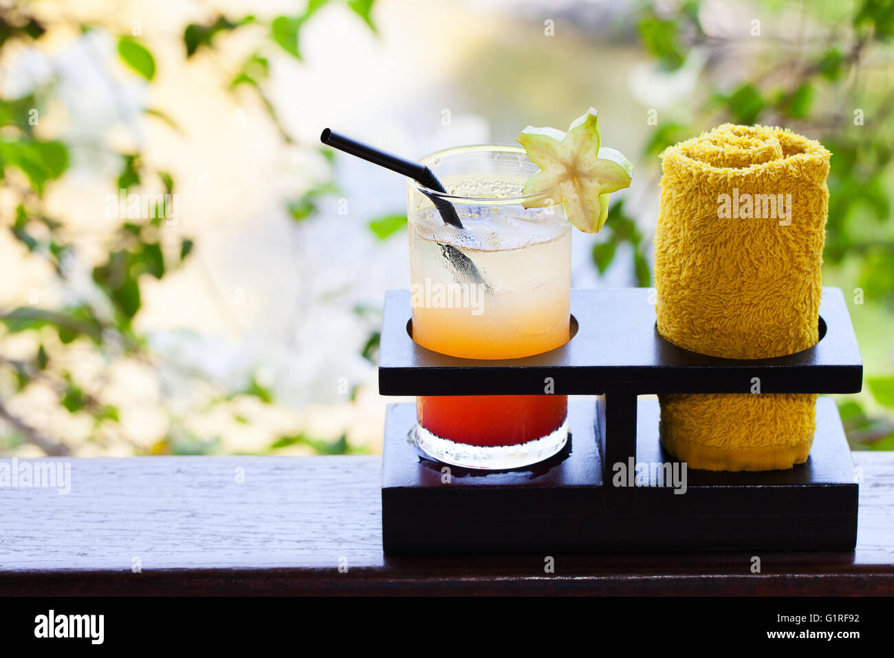 Tropical juice and cold towel, welcome drink in the hotel and spa ...