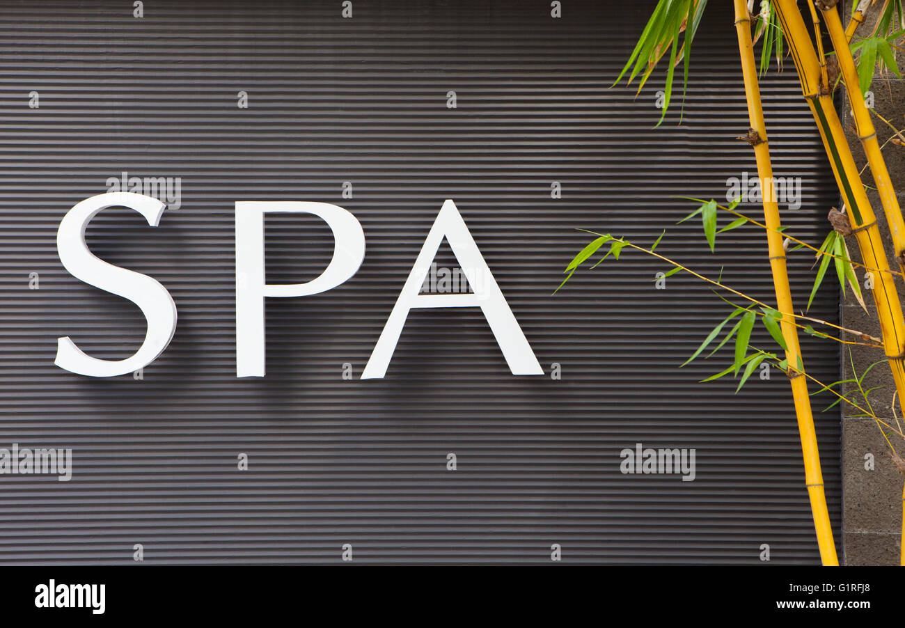 Spa and wellness sign with black stone and bamboo background Stock ...