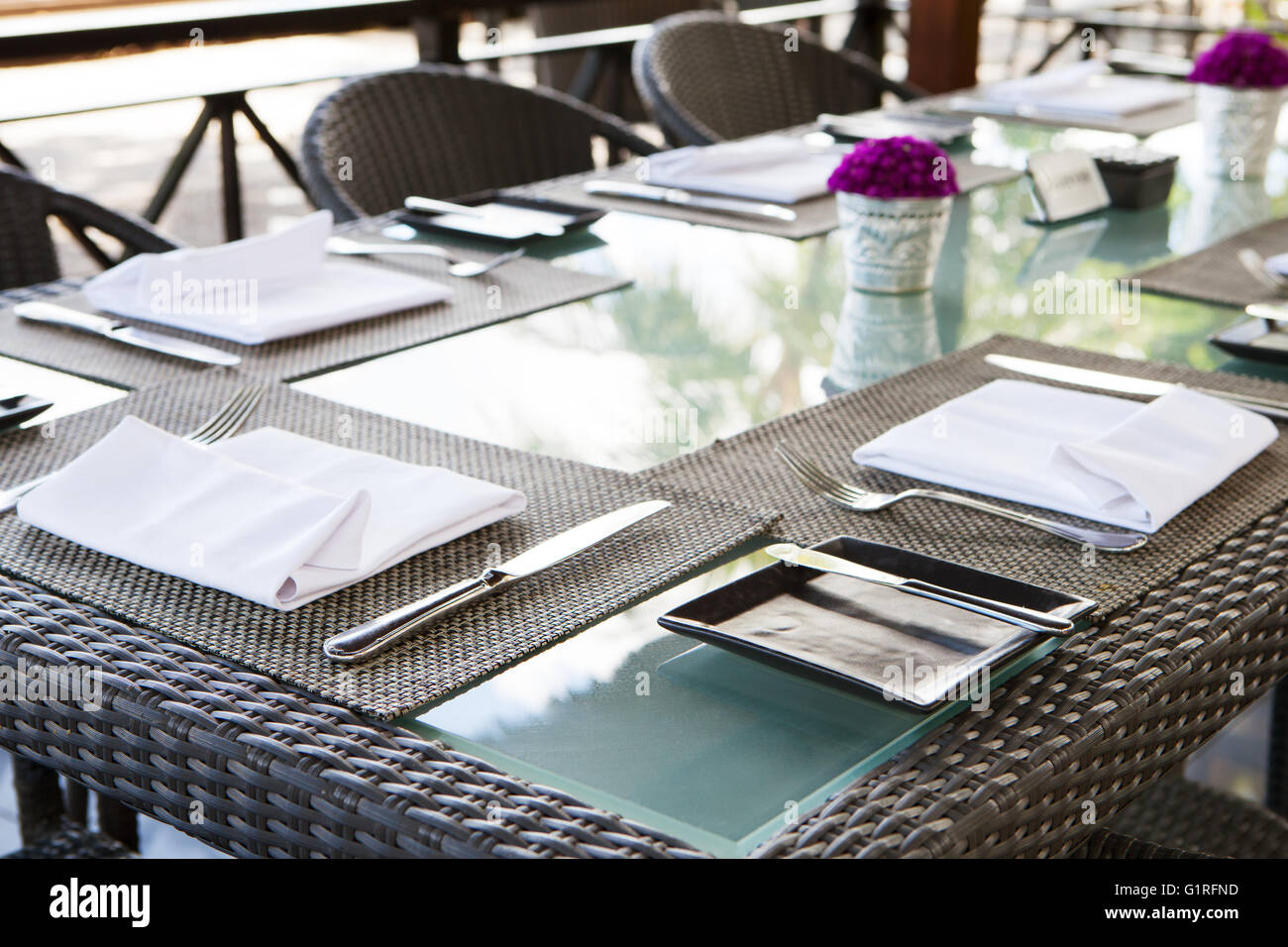 Restaurant table setting Copy space Outdoor summer tropical background ...