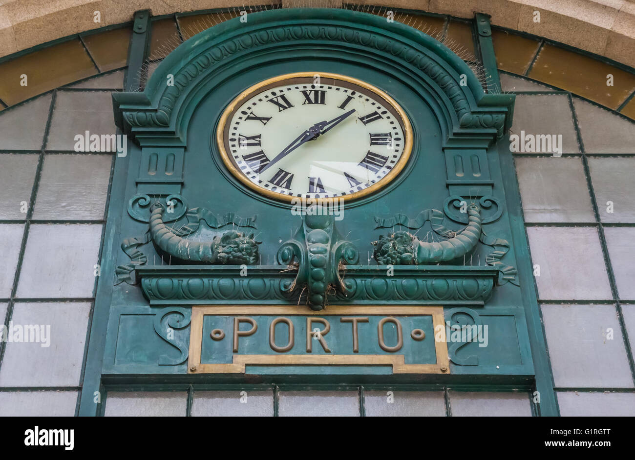 Clock in the railway station of Porto, Portugal Stock Photo - Alamy