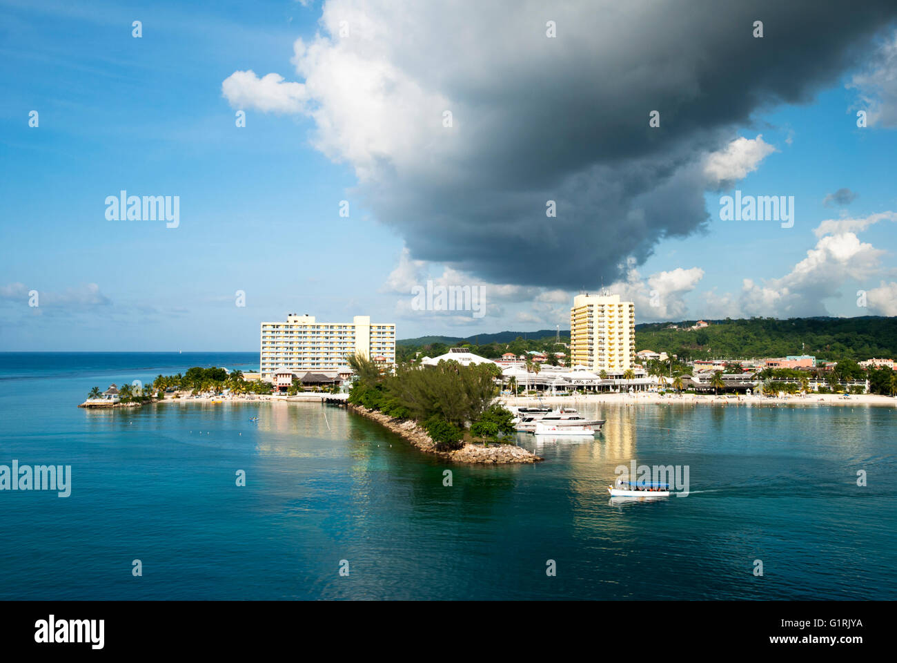 The view of a beach with resort buildings in Ocho Rios town (Jamaica ...