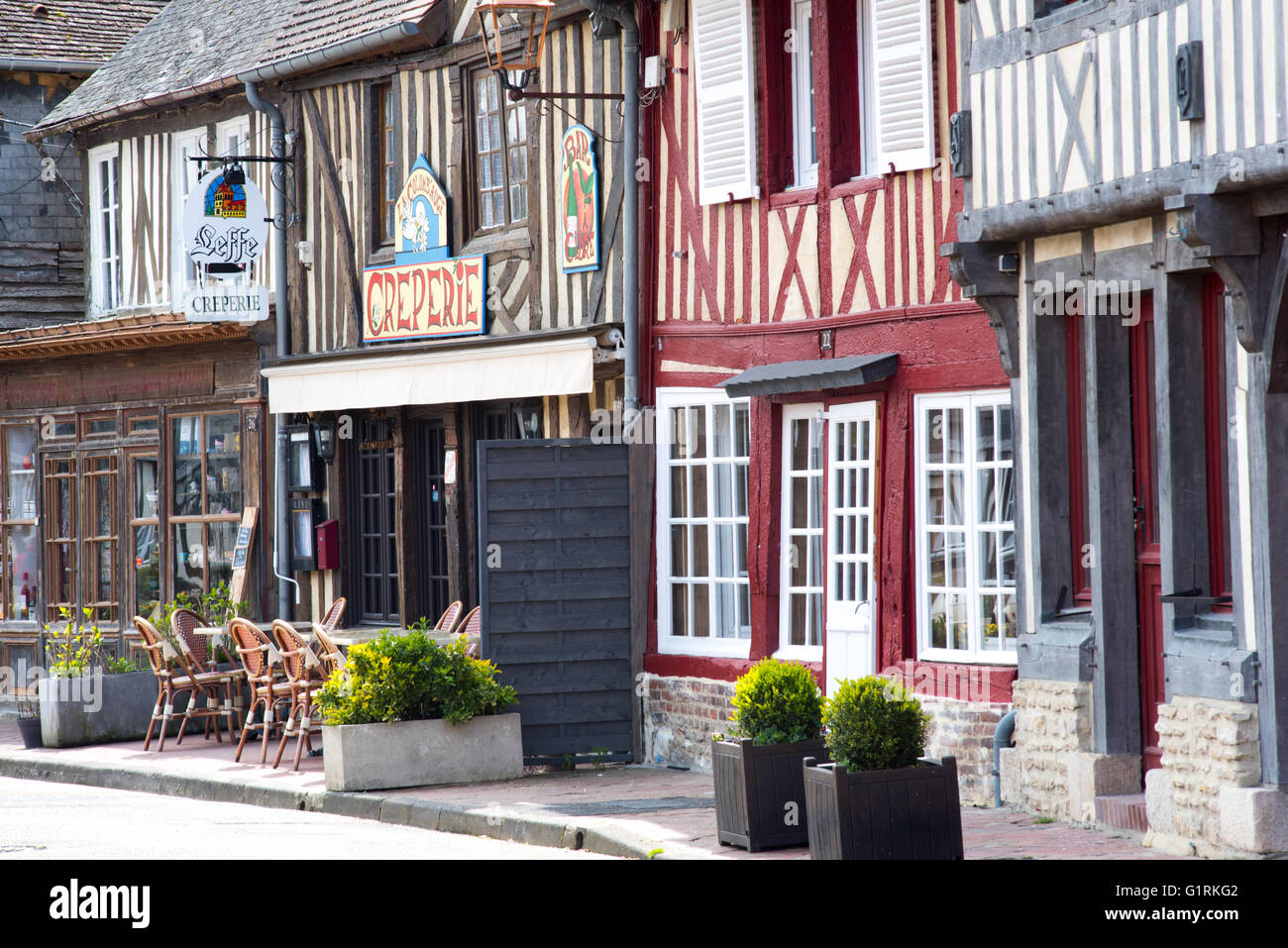 Street in pretty French village of Beuvron-en-Auge, Pays d'Auge region ...