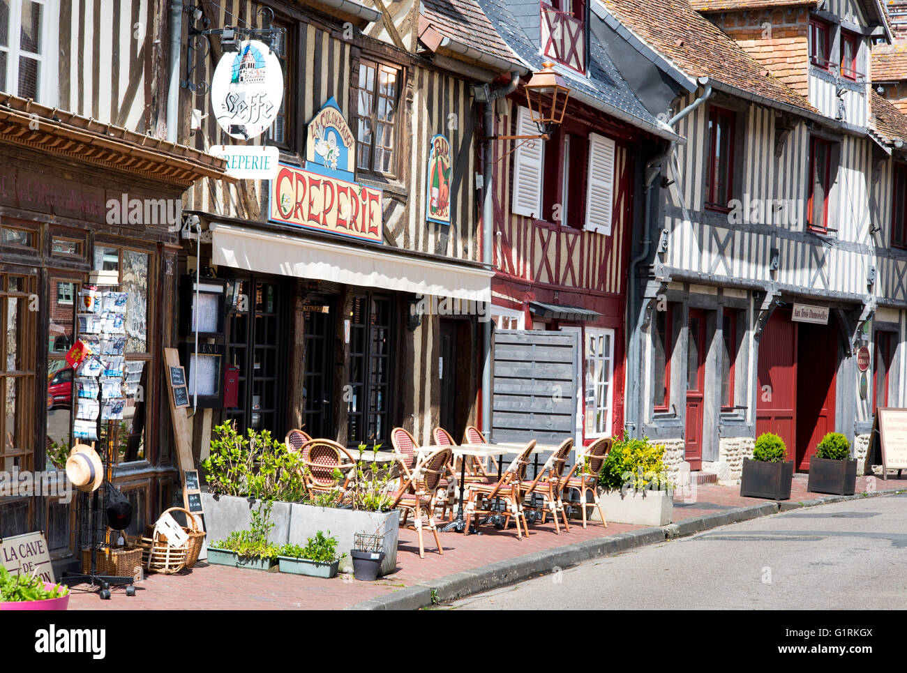 Street in pretty French village of Beuvron-en-Auge, Pays d'Auge region ...