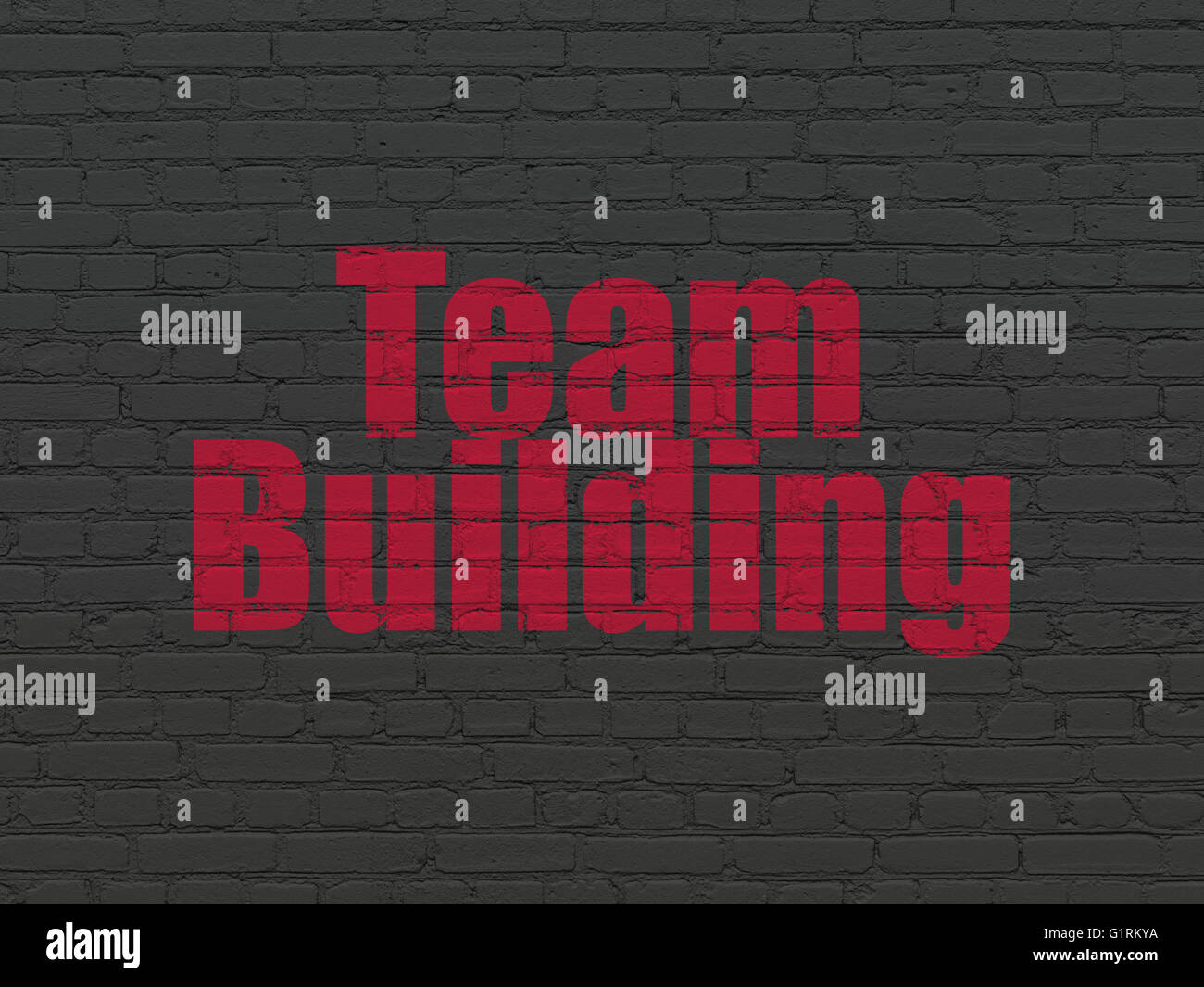 Business concept: Team Building on wall background Stock Photo - Alamy