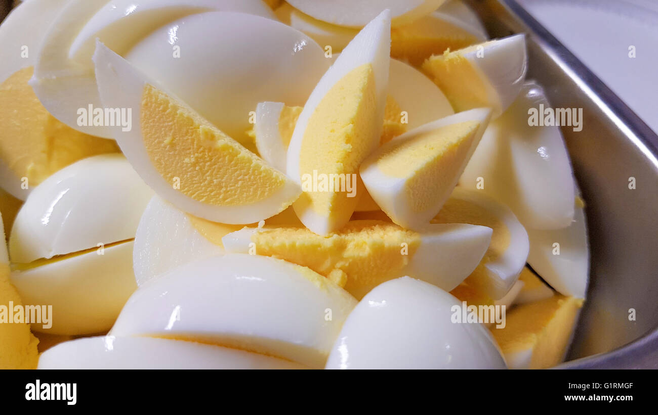 Half of egg halves, in a metal bowl Stock Photo - Alamy