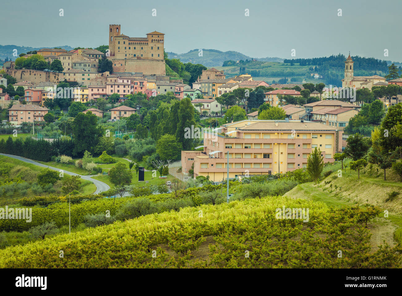 castle and houses of beautiful medieval village on a hilltop ...