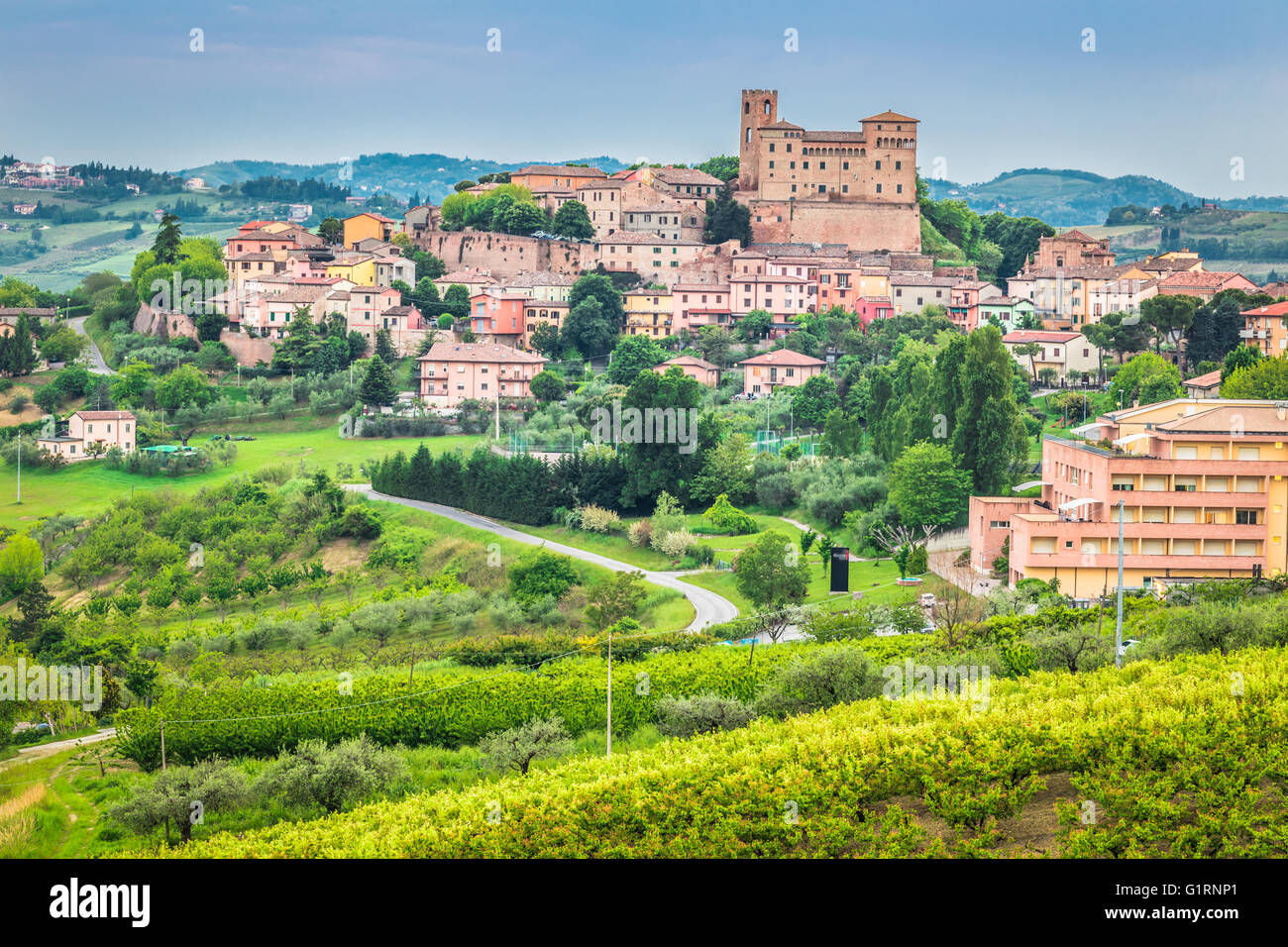 castle and houses of beautiful medieval village on a hilltop ...