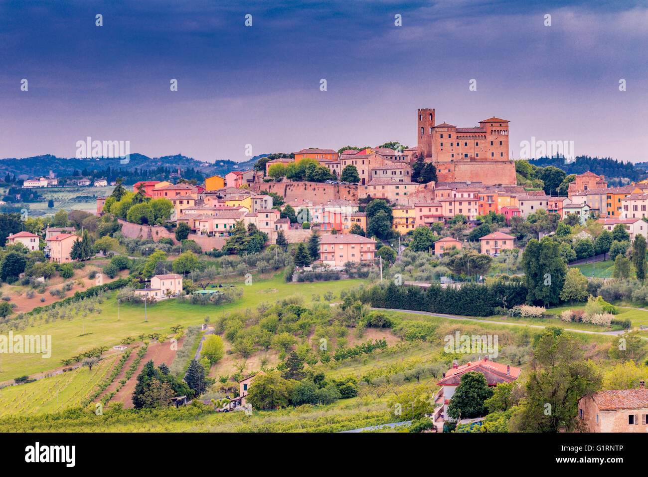 imposing castle and roofs of colored houses brighten the tranquility of ...