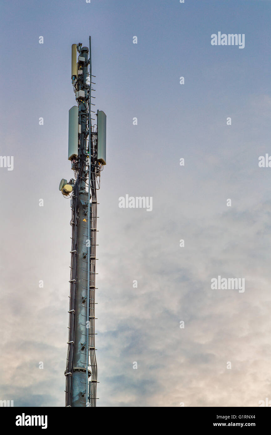 cell tower on sky background Stock Photo - Alamy
