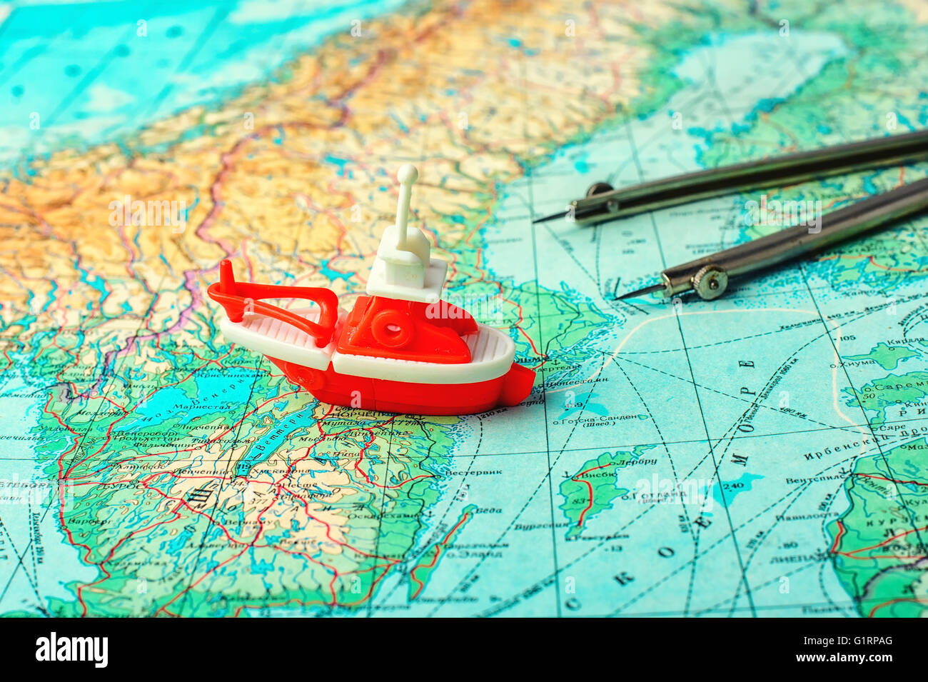 Old map of the area and symbolic of marine boat Stock Photo - Alamy