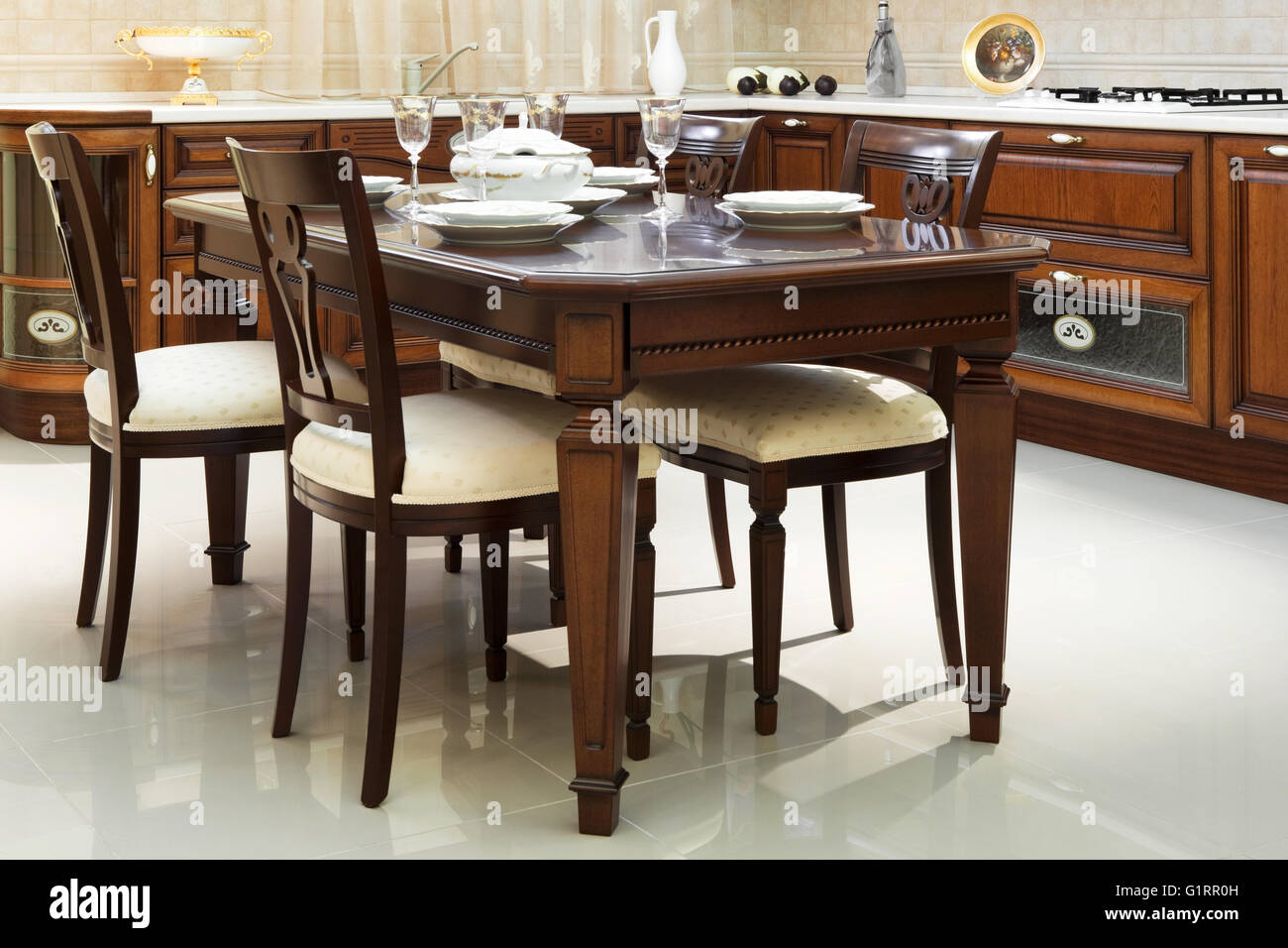 table with the dishes in the modern kitchen Stock Photo - Alamy