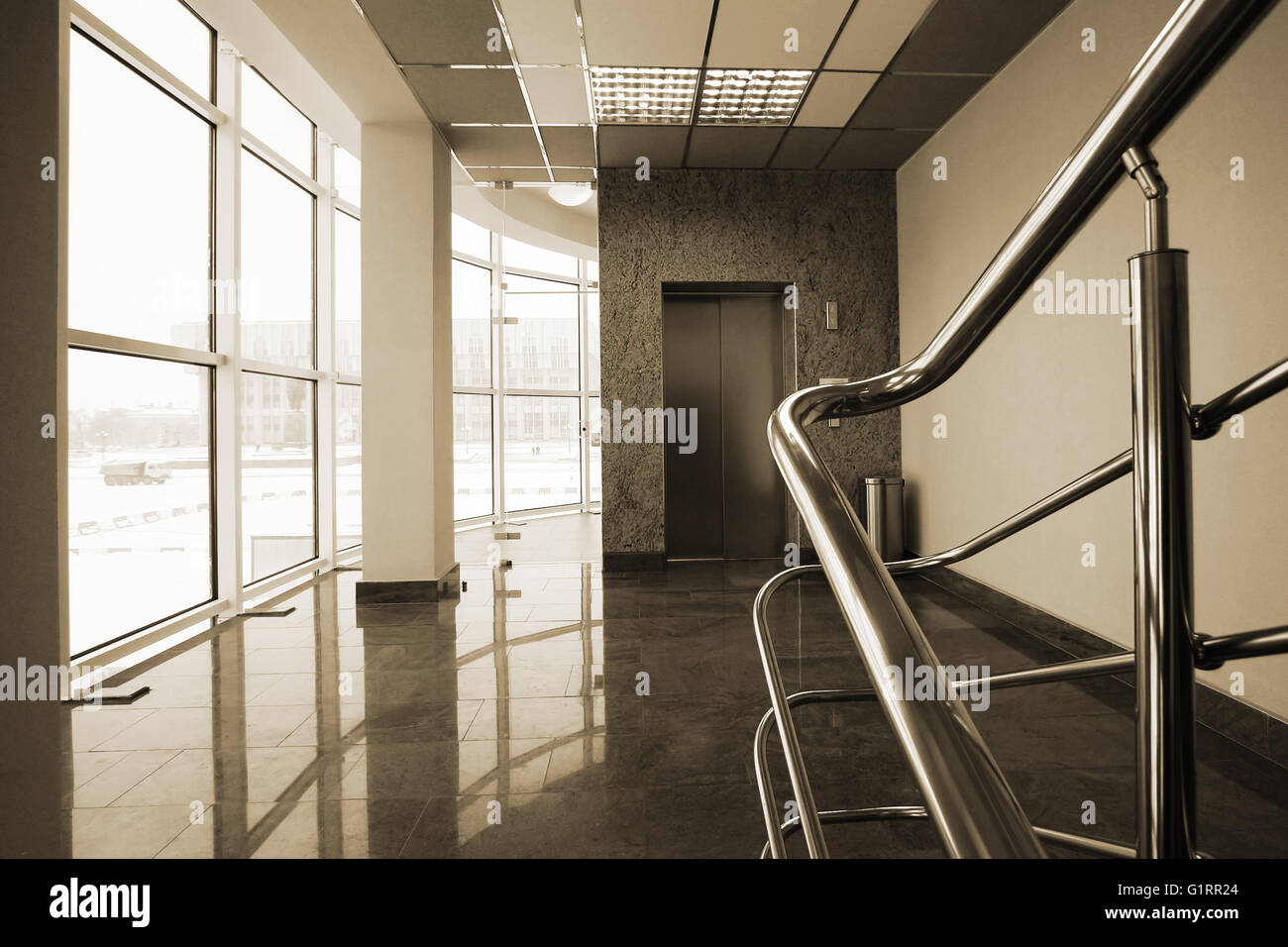 The lift and the big window in modern hotel Stock Photo - Alamy
