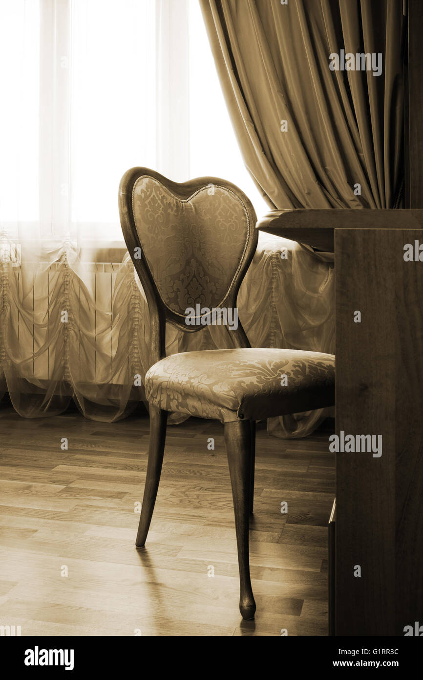 table and chair by the window in a modern apartment Stock Photo - Alamy