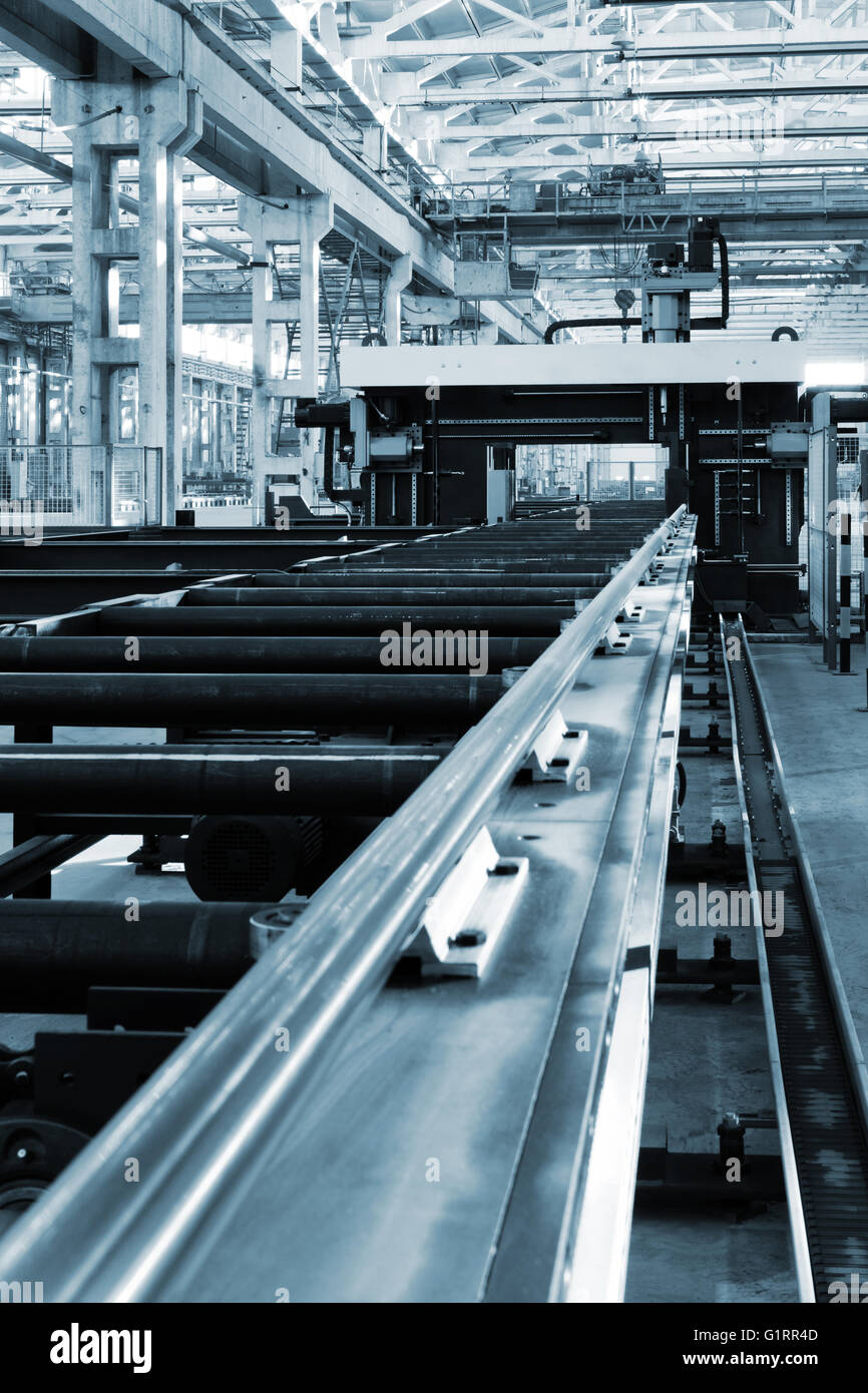 new and powerful machine in modern workshop Stock Photo - Alamy