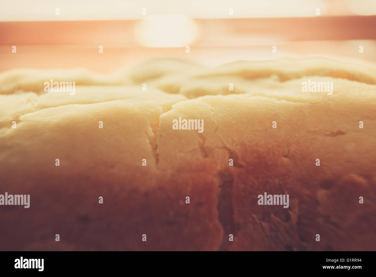 A loaf of fresh bread by the window bathed in sunlight Stock Photo - Alamy