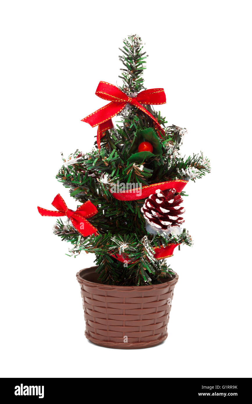 a small Christmas tree on a white background Stock Photo - Alamy