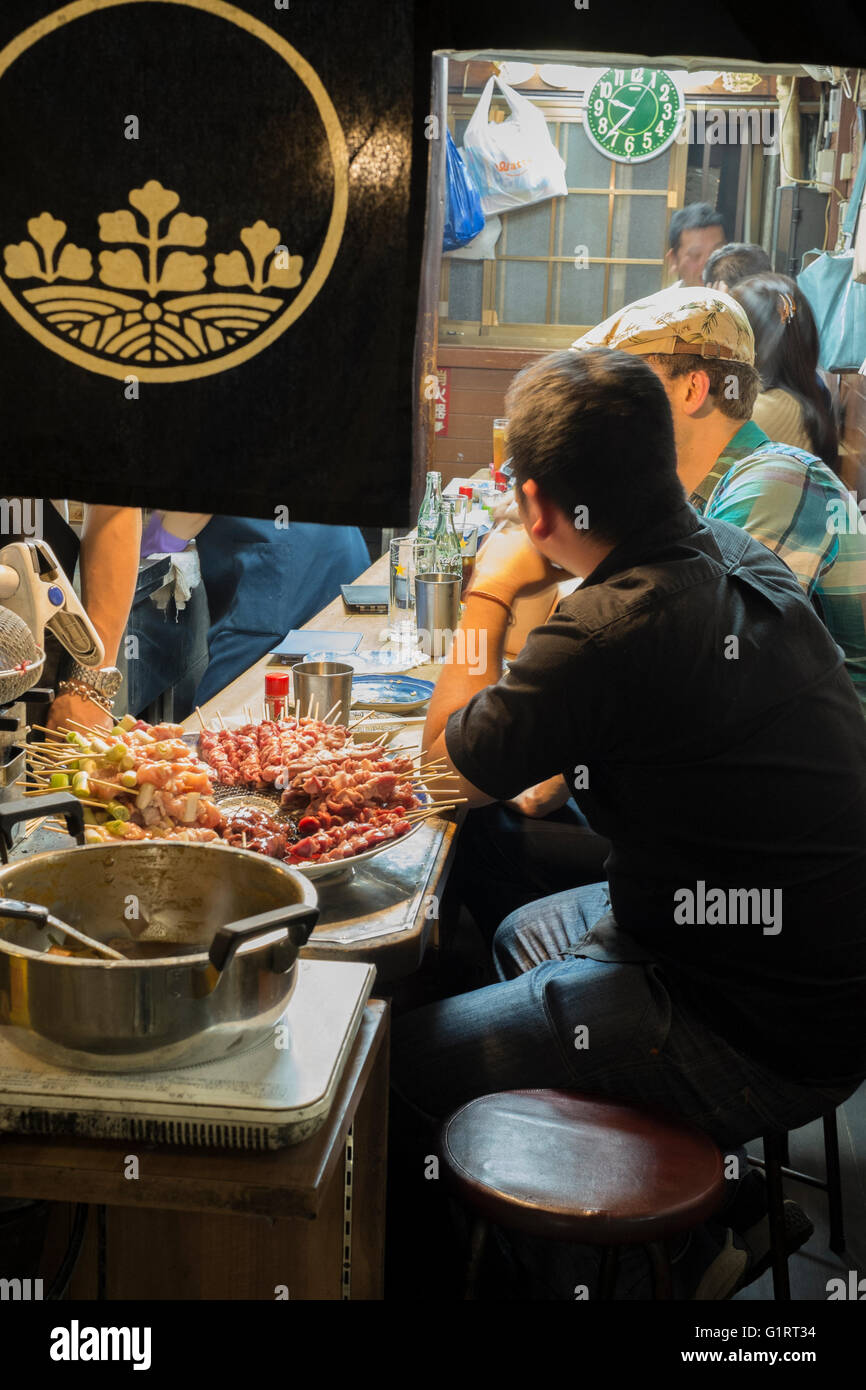 People out eating in Tokyo, Japan Stock Photo - Alamy