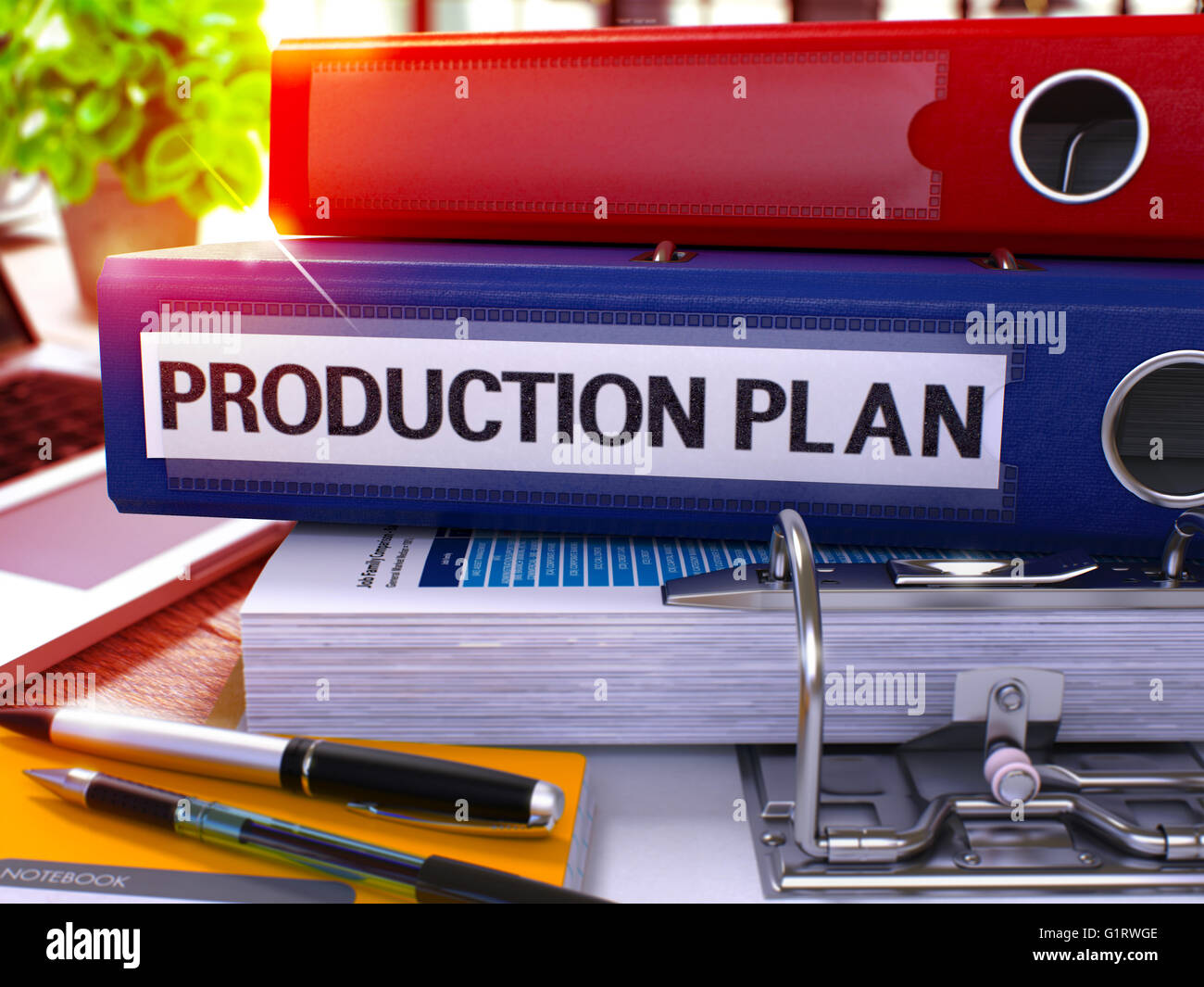 Blue Office Folder with Inscription Production Plan Stock Photo - Alamy