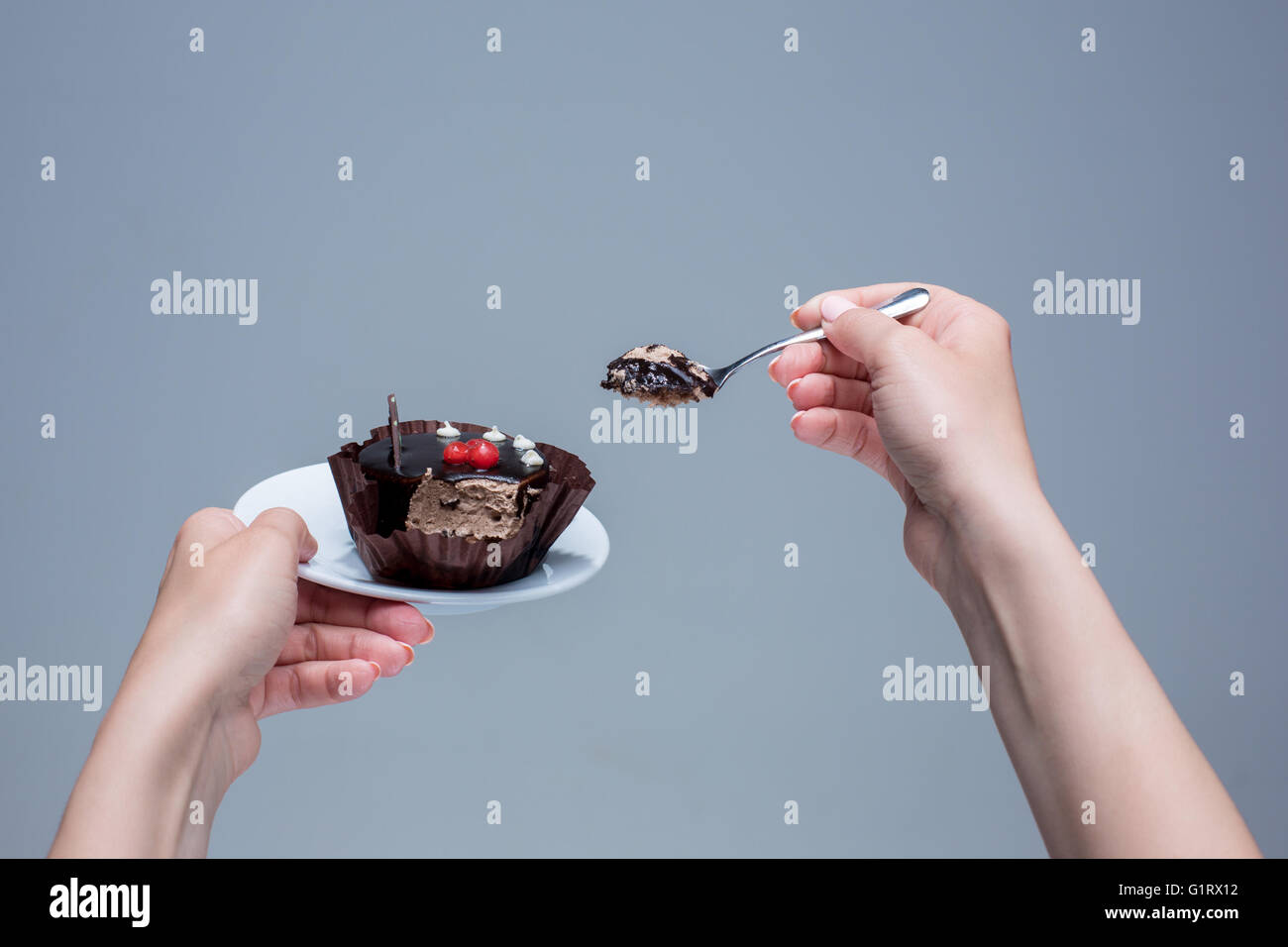 Hands holding cupcake one birthday hi-res stock photography and images ...