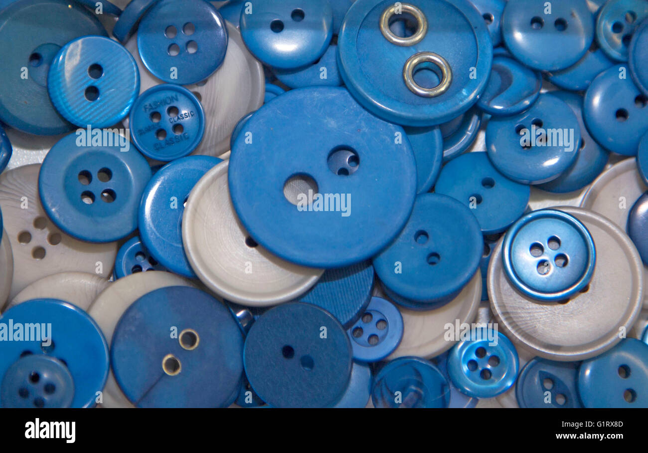 Box of blue buttons, London Stock Photo - Alamy