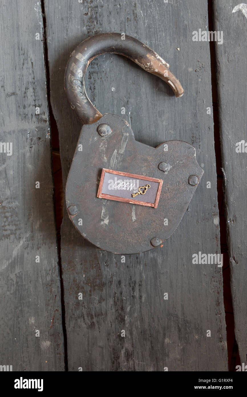 Open sign and old padlock Stock Photo - Alamy