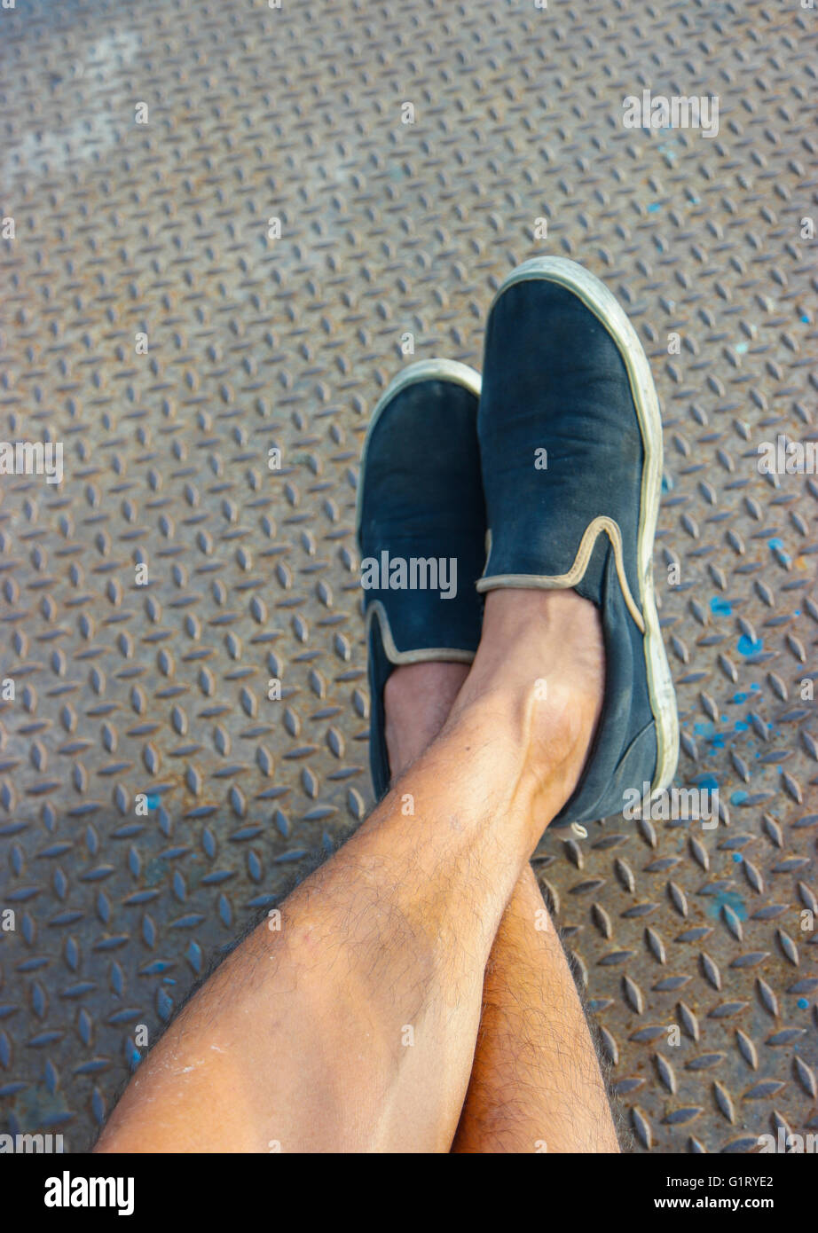 Foot cross hi-res stock photography and images - Alamy