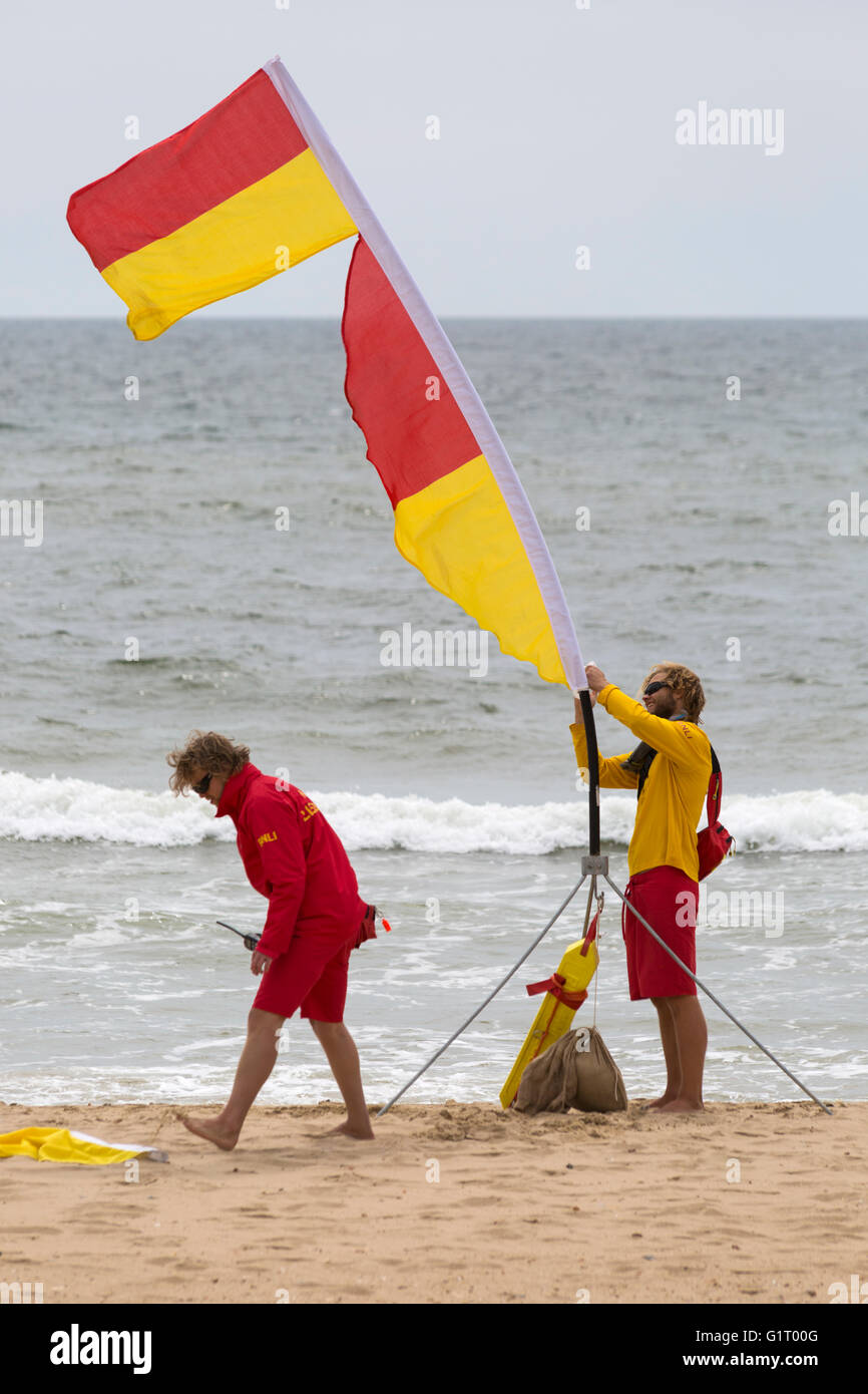 Always swim between the red and yellow flags hi-res stock photography ...