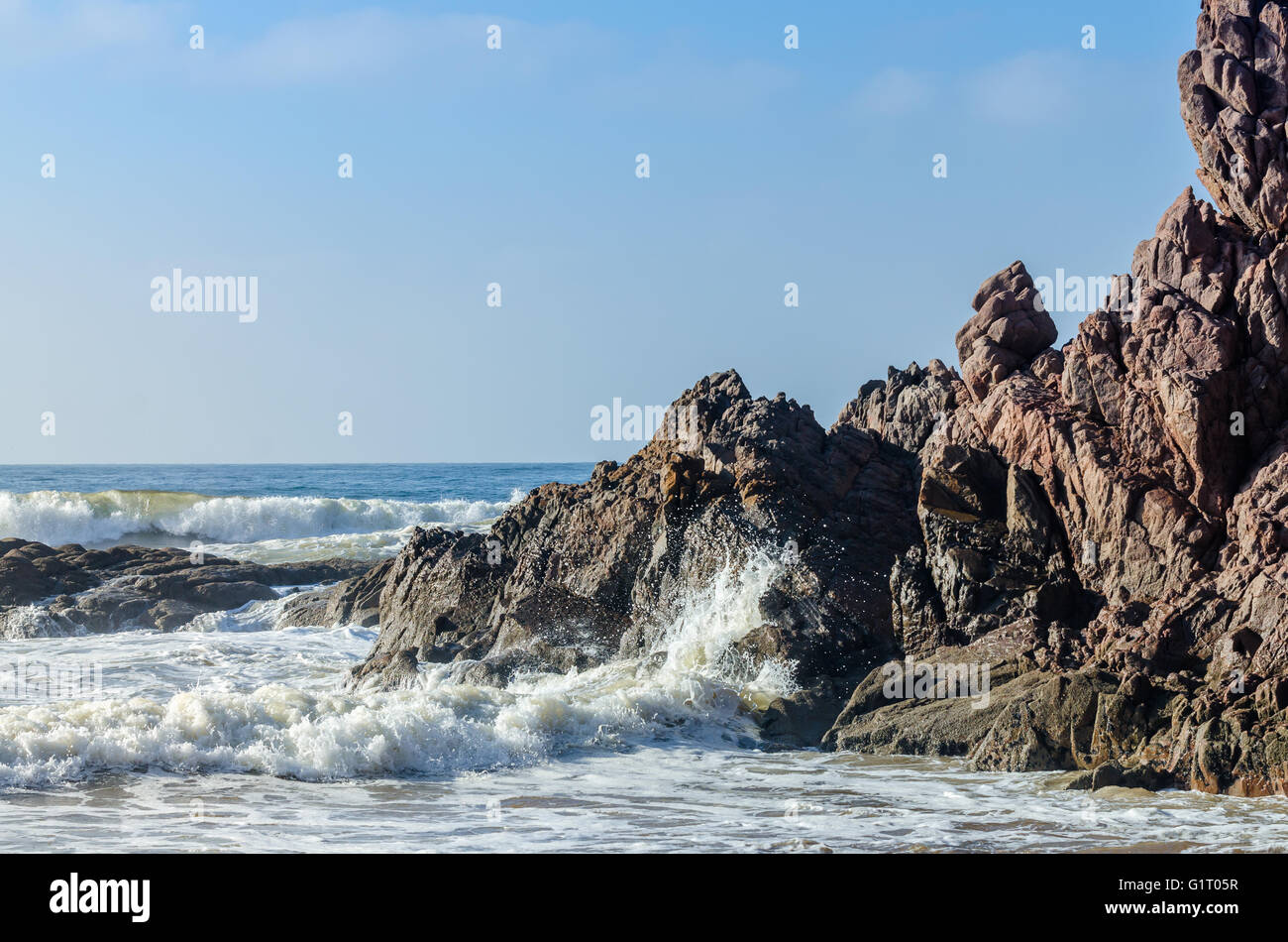 Beautiful big rock on a beach of pacific ocean Stock Photo - Alamy