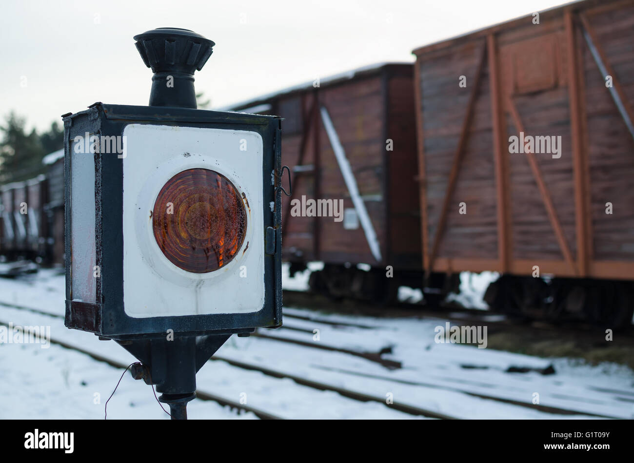 Traditional railway old iron switch with orange lamp in Russian railway ...
