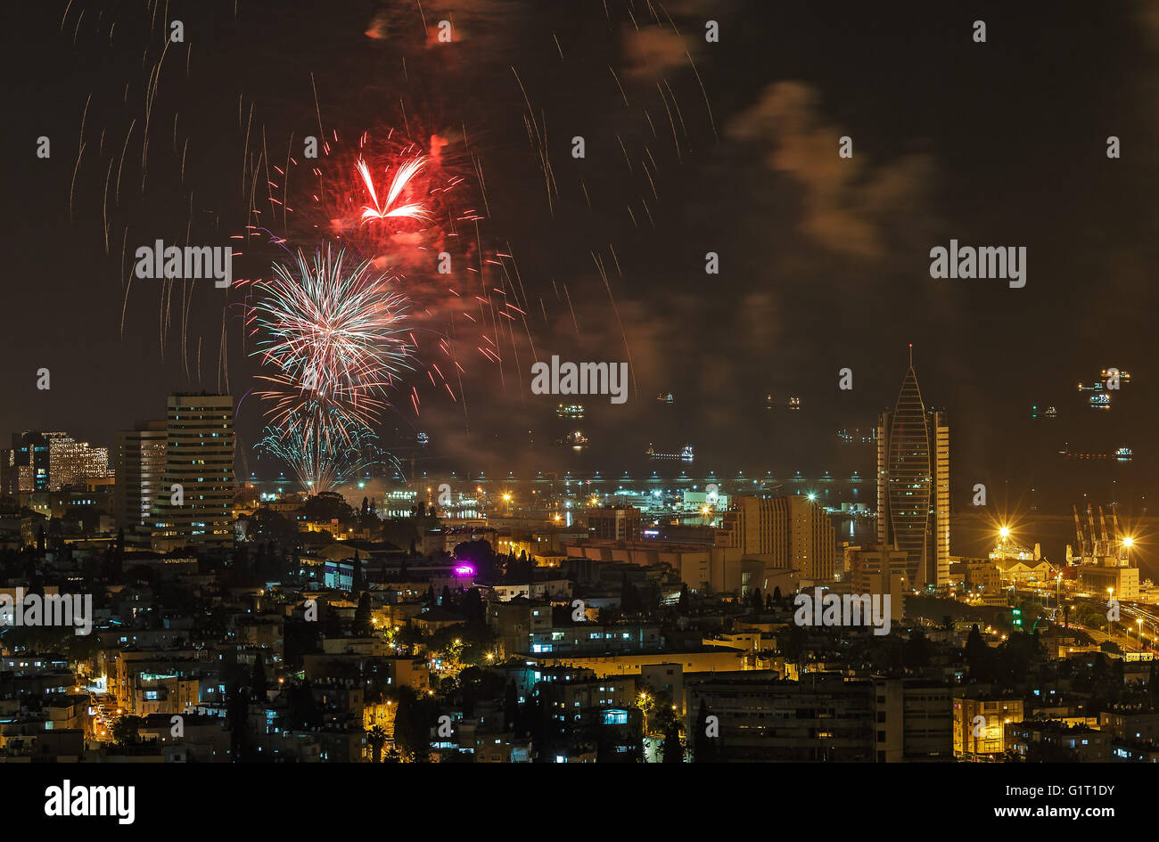 Beautiful fireworks on the background of the Bay of Haifa Stock Photo ...
