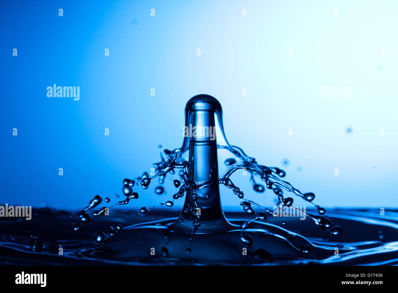 Water drop falling and colliding with another one Stock Photo - Alamy