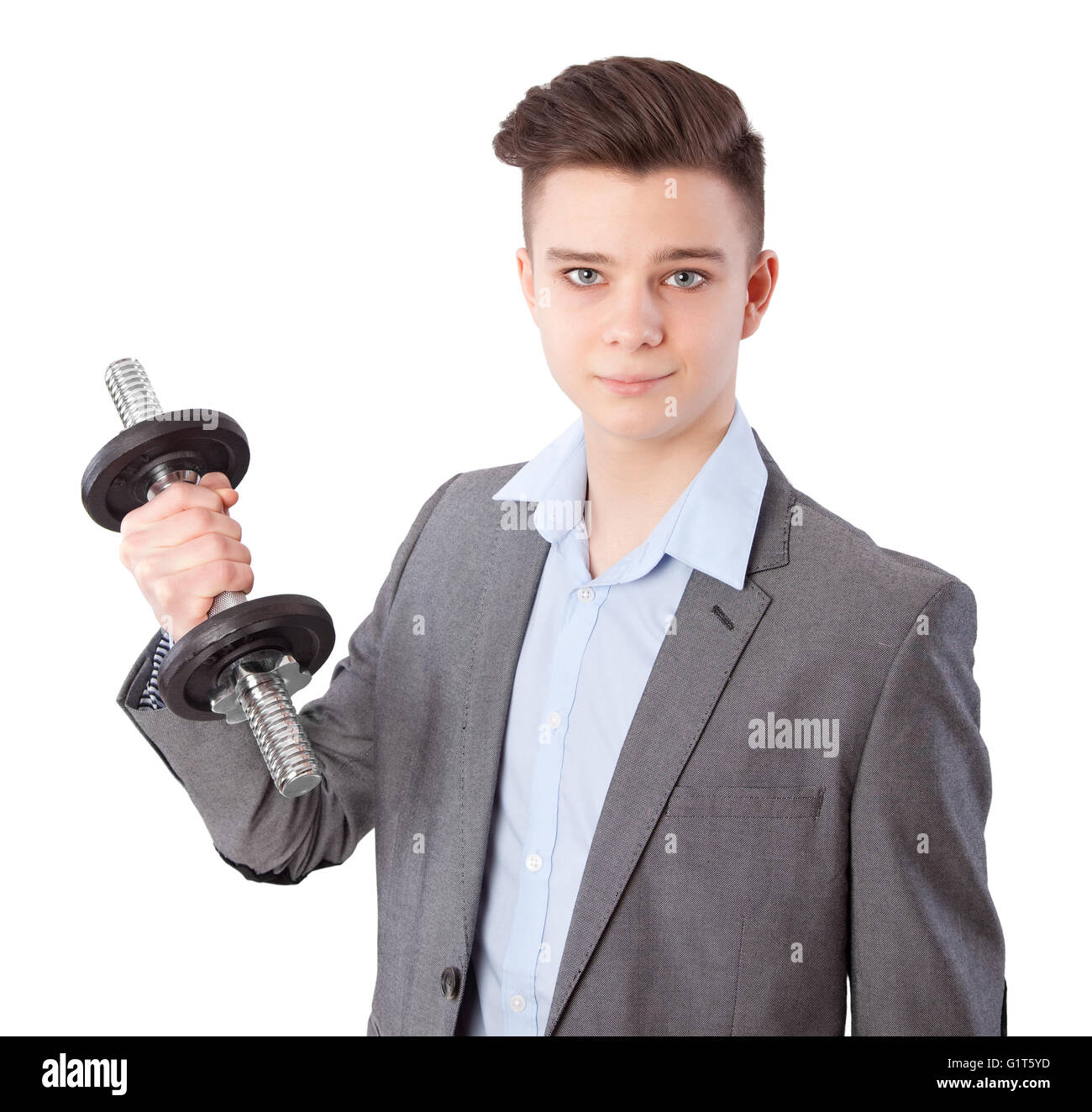 teenage boy exercising with dumbbell Stock Photo - Alamy