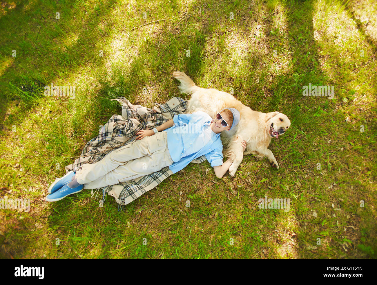 Resting with friend Stock Photo - Alamy