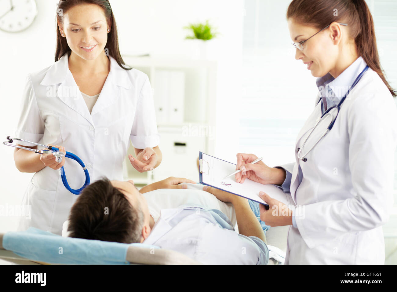 Man during medical exam Stock Photo - Alamy