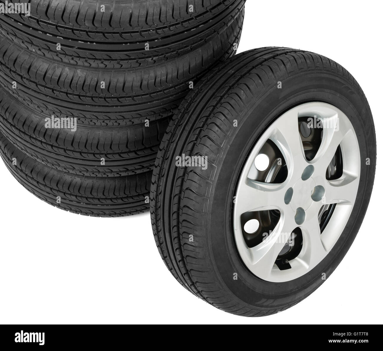 Stack of wheels on white background Stock Photo - Alamy