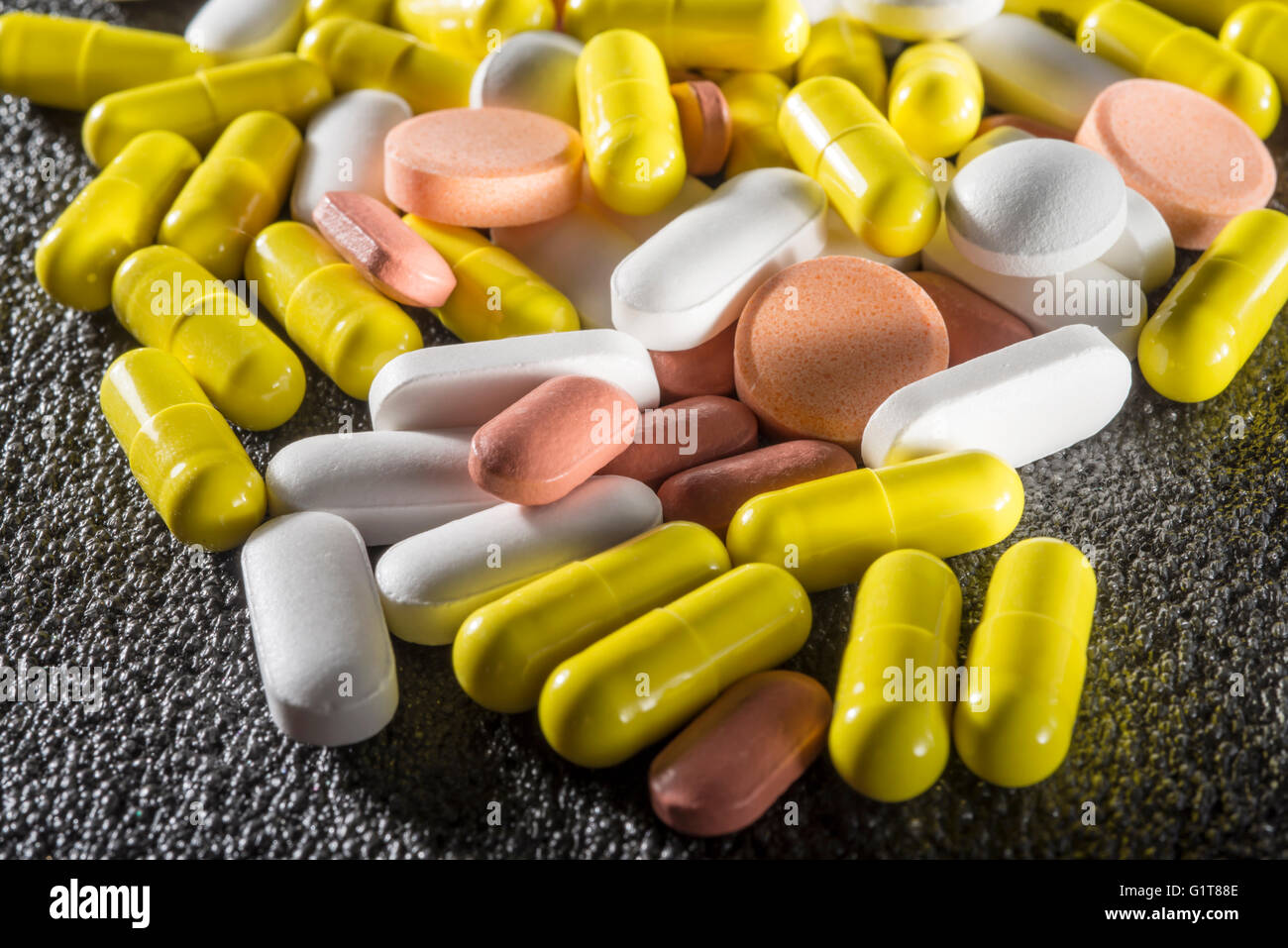 Multi colored capsule hi-res stock photography and images - Alamy