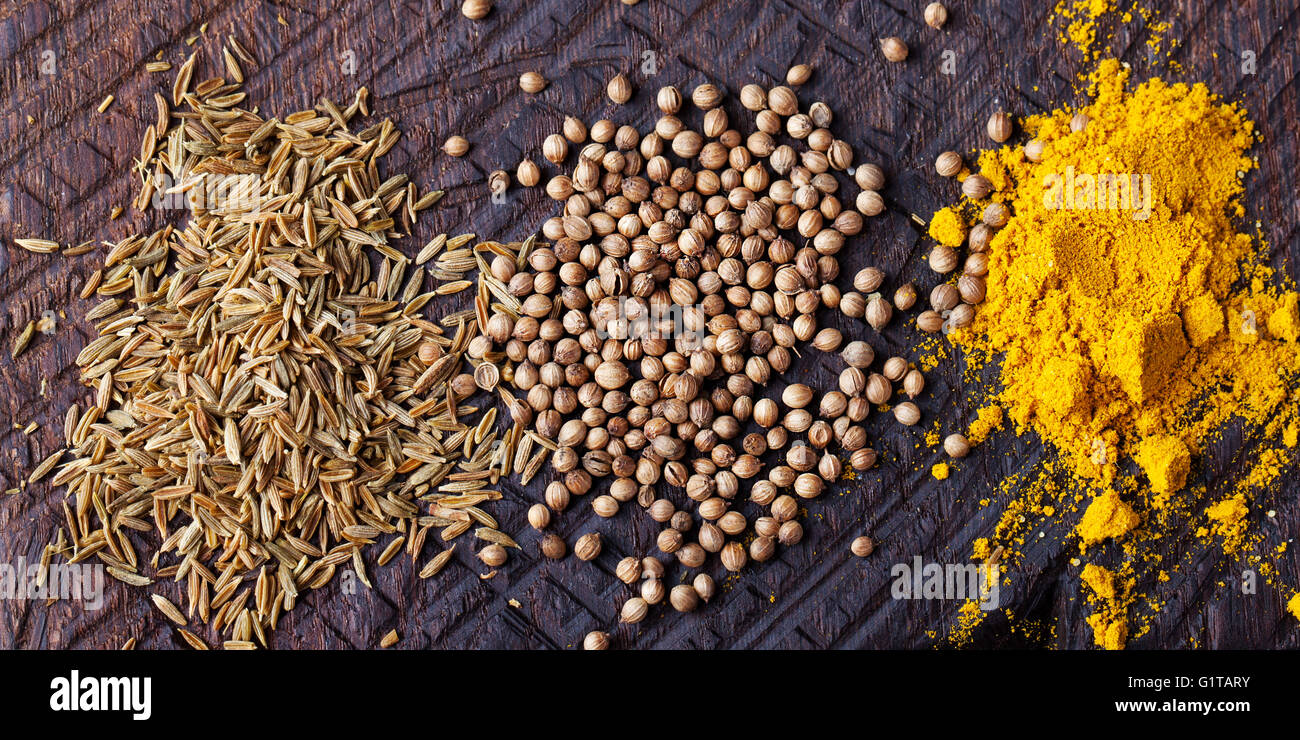 Cumin and spices on rustic wood background hi-res stock photography and ...